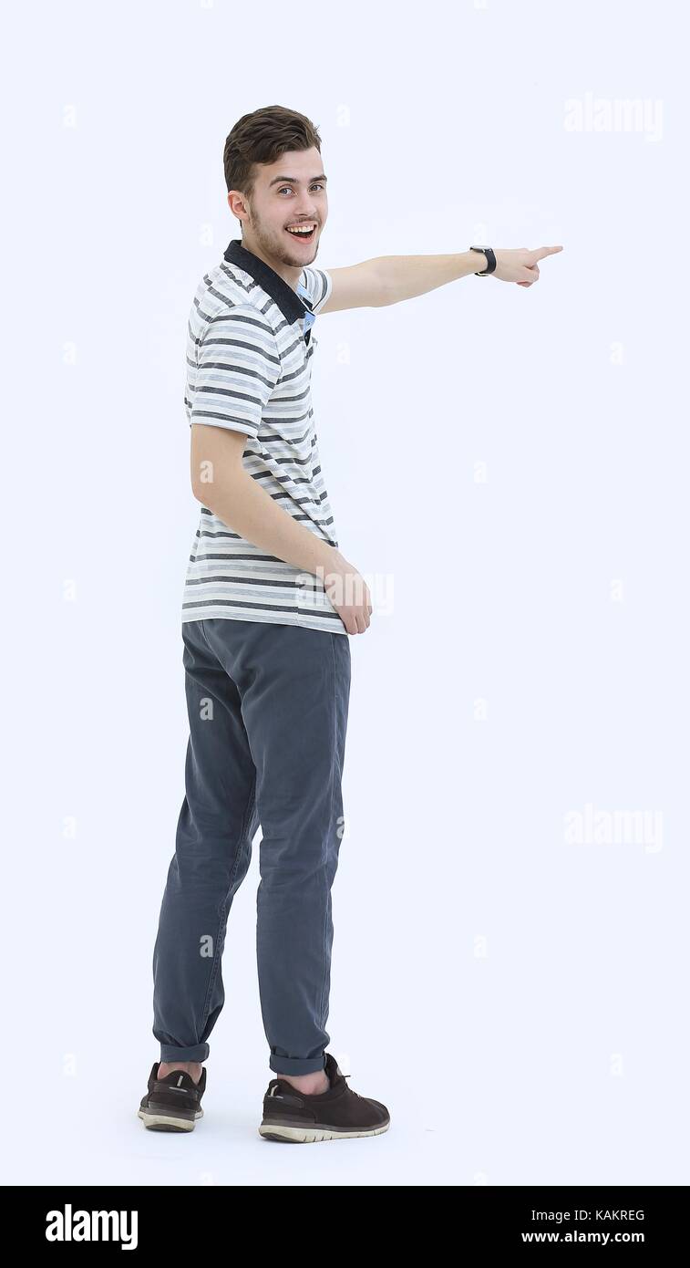 rear view.modern young man pointing forward. isolated on white ...