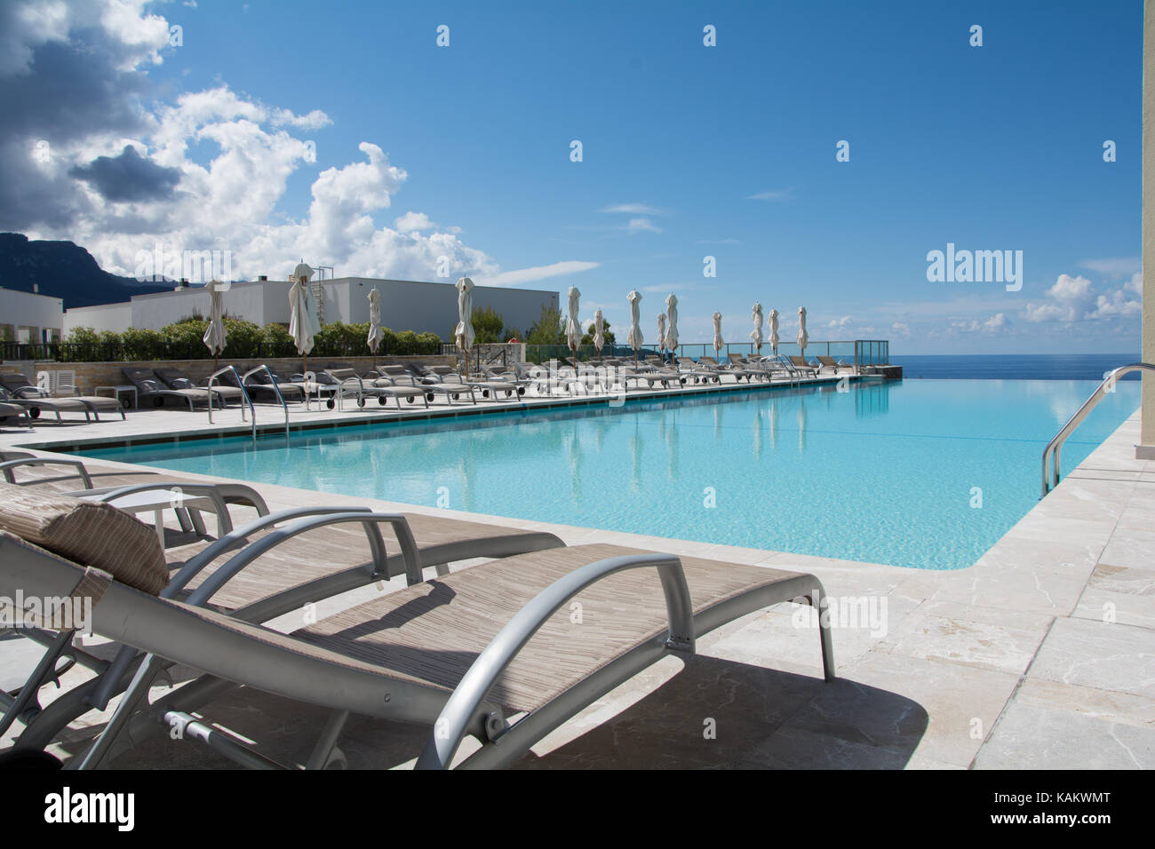 An infinity pool hotel under the summer heat in Mallorca, Spain Stock ...