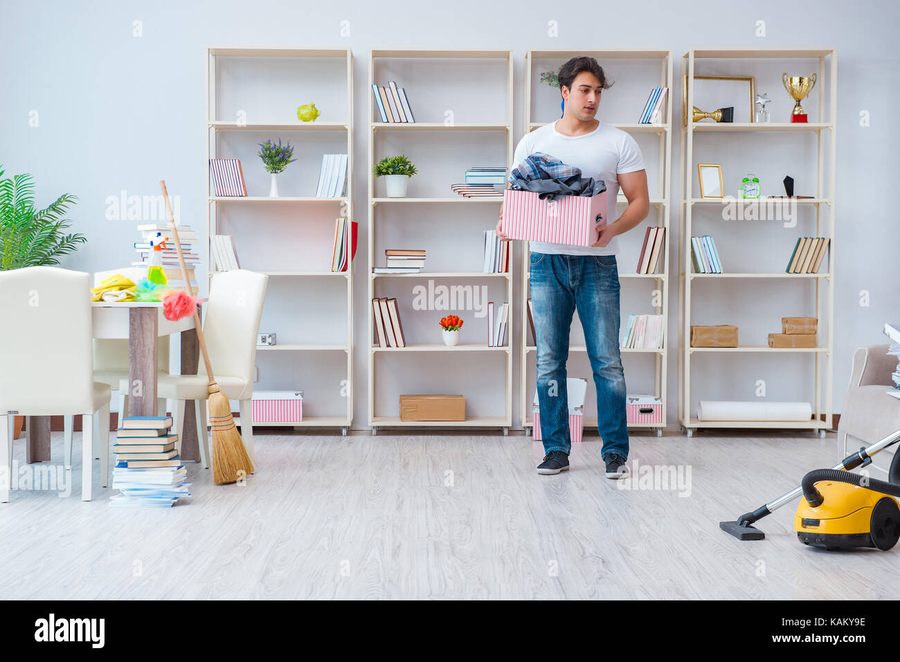Man doing cleaning at home Stock Photo - Alamy