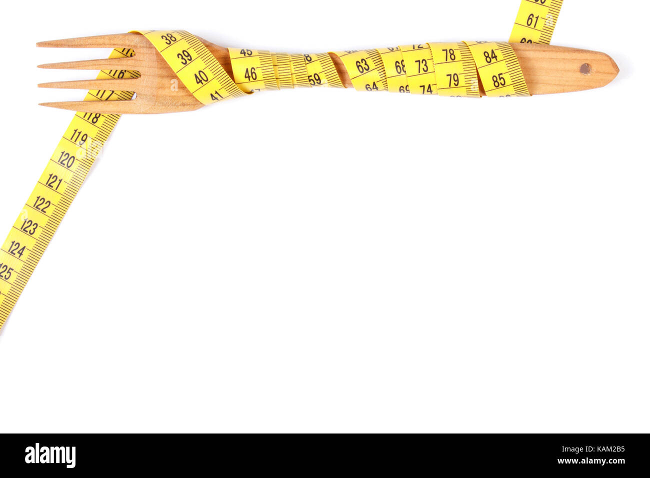 Wooden fork wrapped centimeter, concept of slimming, healthy lifestyle ...