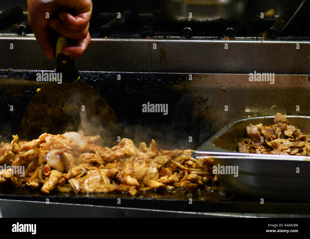 Grilling the meat Stock Photo - Alamy