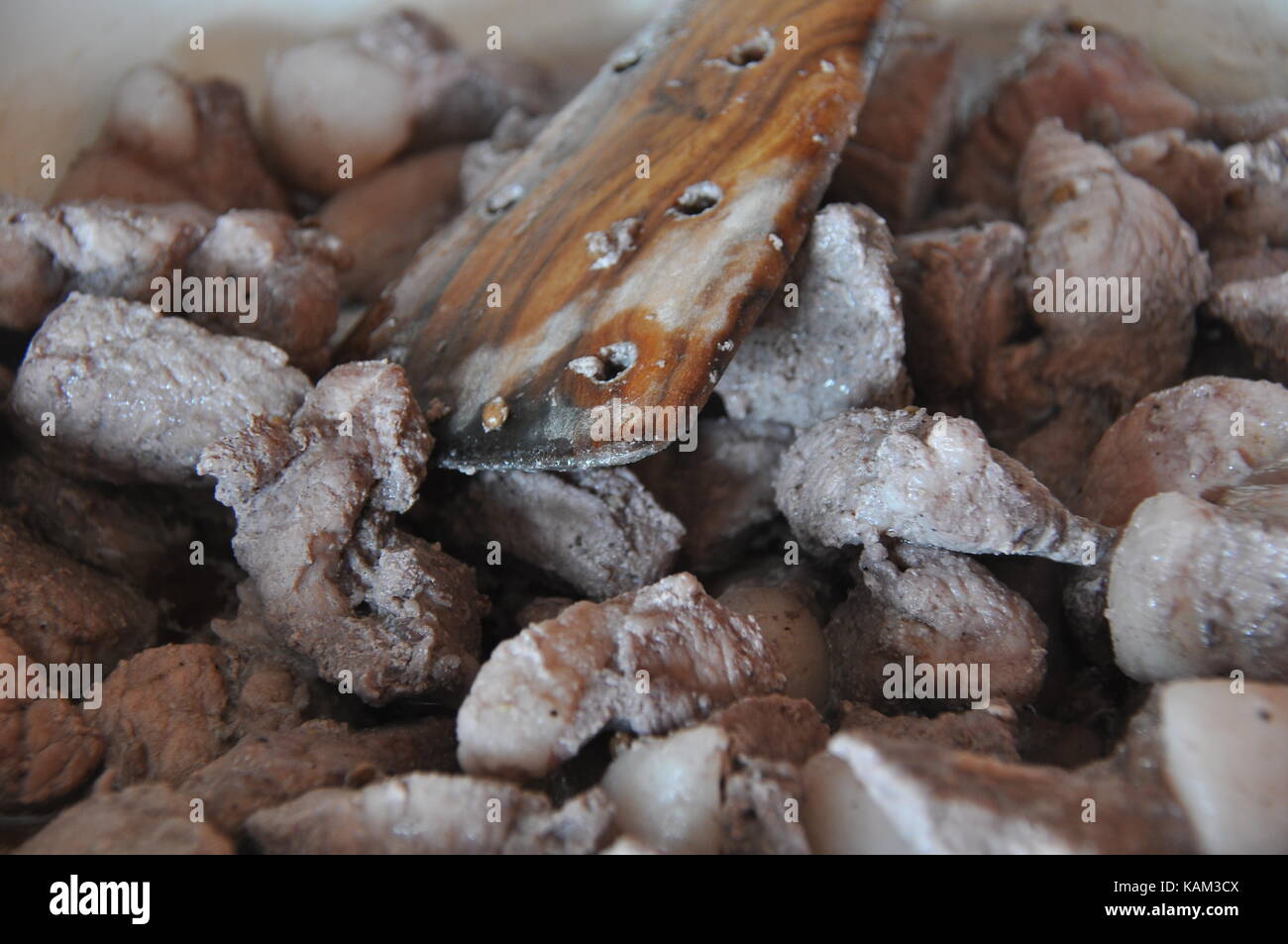 Afelia. Cypriot national dish of marinated and stewed pork in aromatic ...