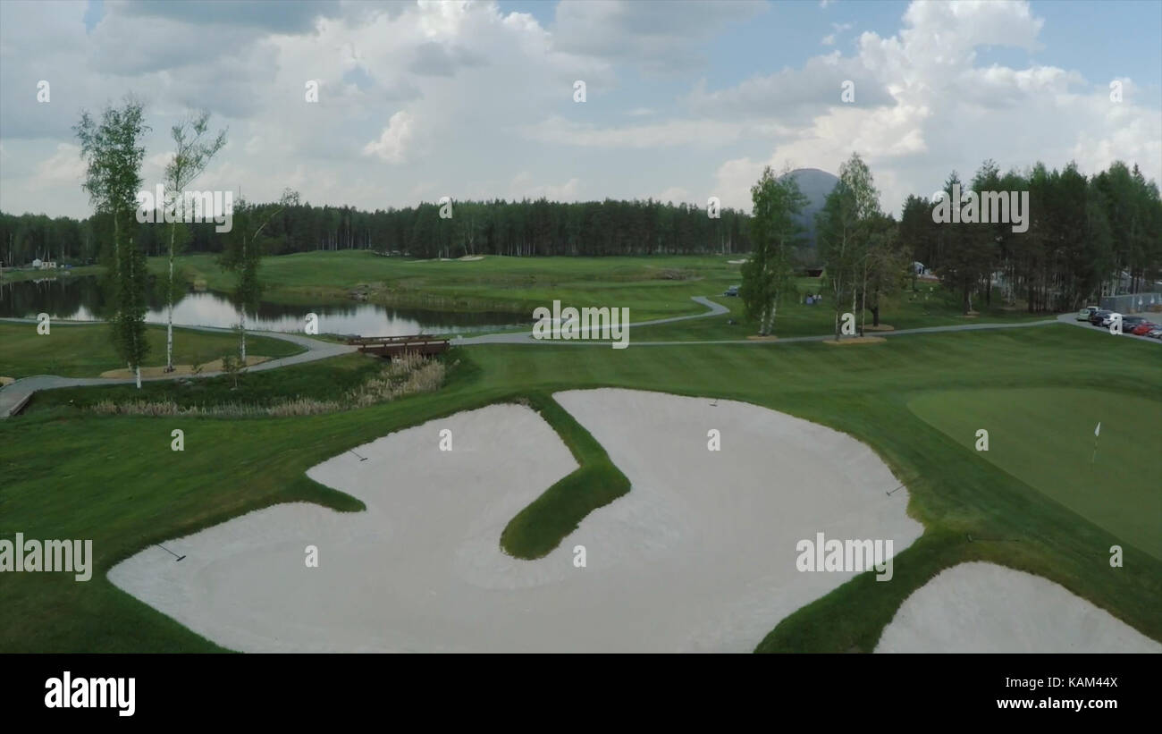 Aerial view Golf course, ponds and green lawns of the Golf course. Sand ...