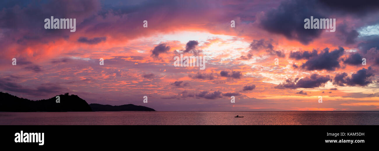 Beautiful vivid sunset at paradise beach Stock Photo - Alamy