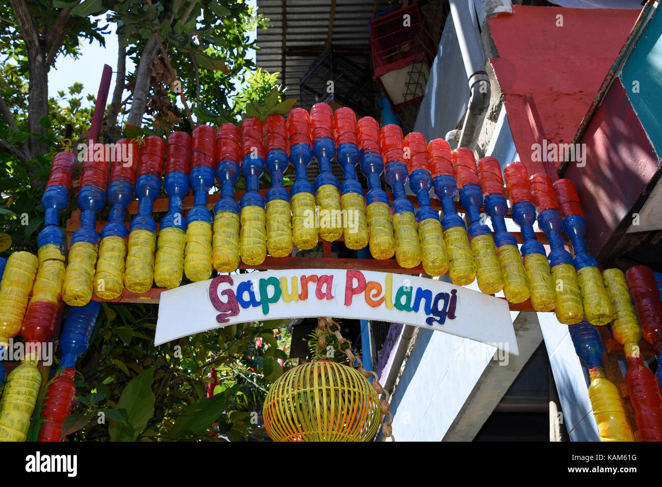 Plastic bottles used as an entrance arch at the Rainbow Village in ...