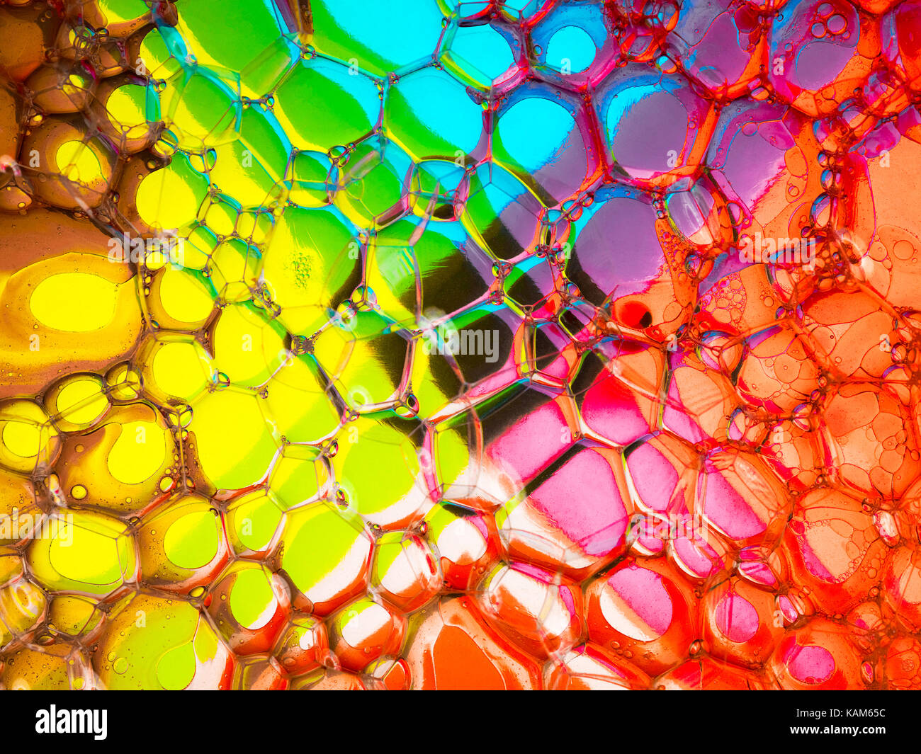 Soap bubbles on a colourful cross-shaped background Stock Photo - Alamy