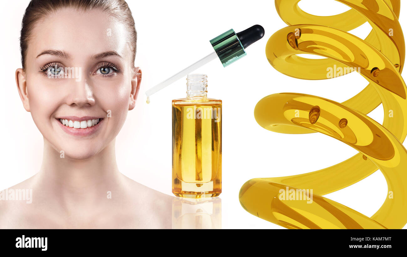 Cosmetic oil applying on face of young woman Stock Photo - Alamy