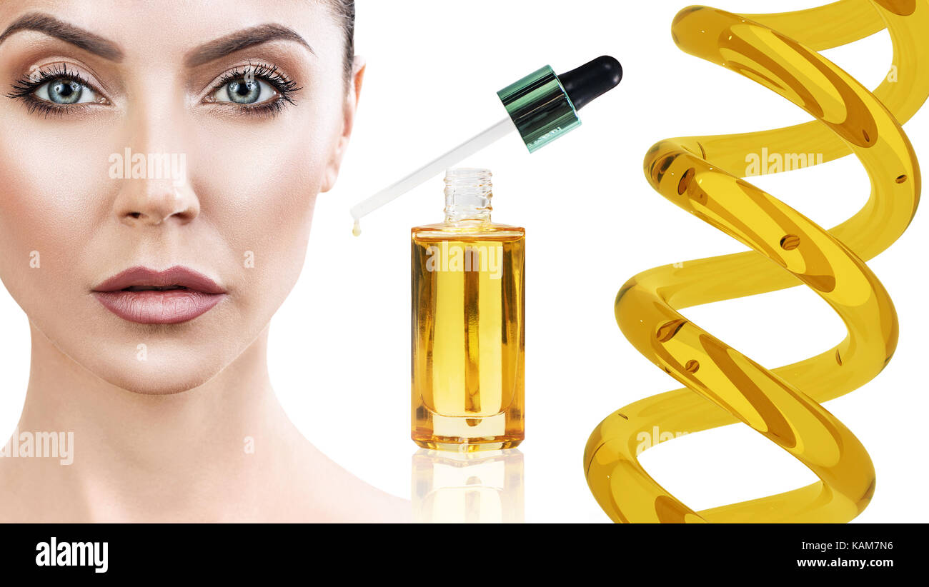 Cosmetic oil applying on face of young woman Stock Photo - Alamy