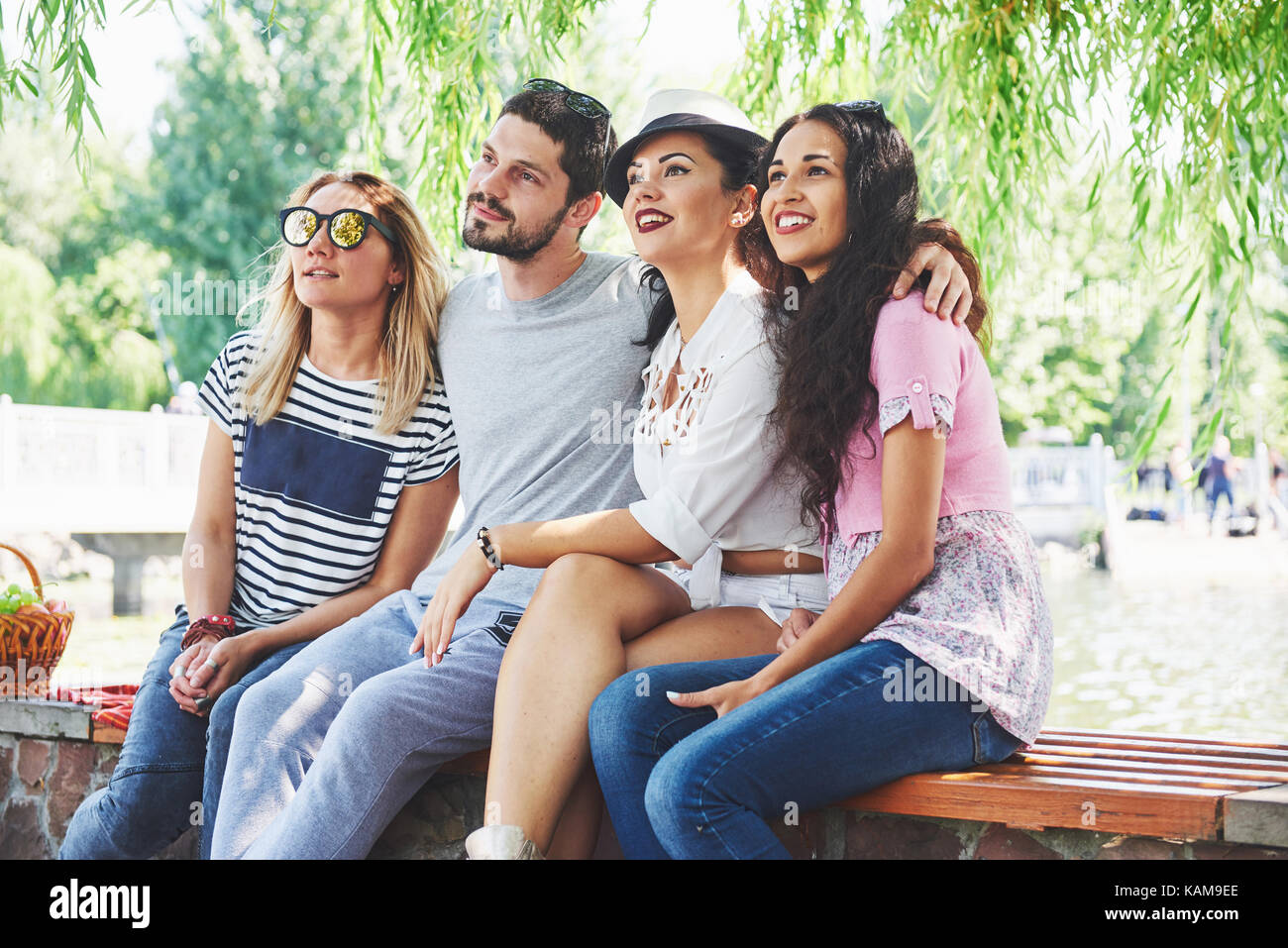 Group of friends relaxing and playing together. Young people chat on ...