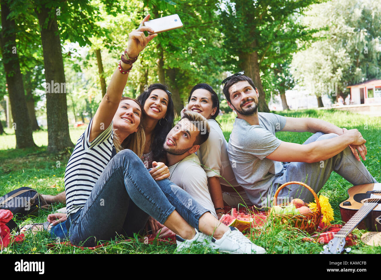 Happy friends having fun outside in nature Stock Photo - Alamy