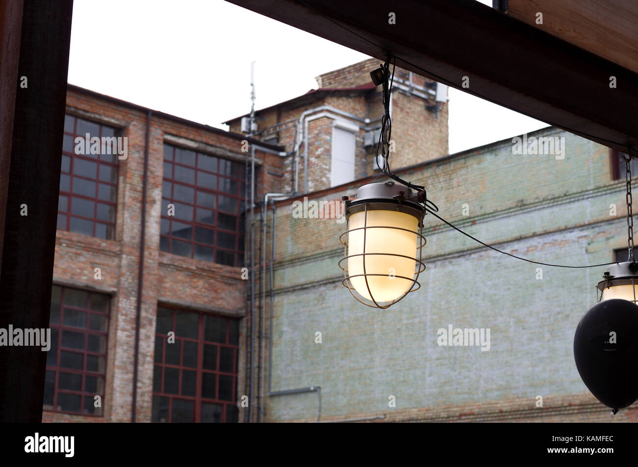 Unusual street lamp. Vintage street lamp in the evening Stock Photo - Alamy