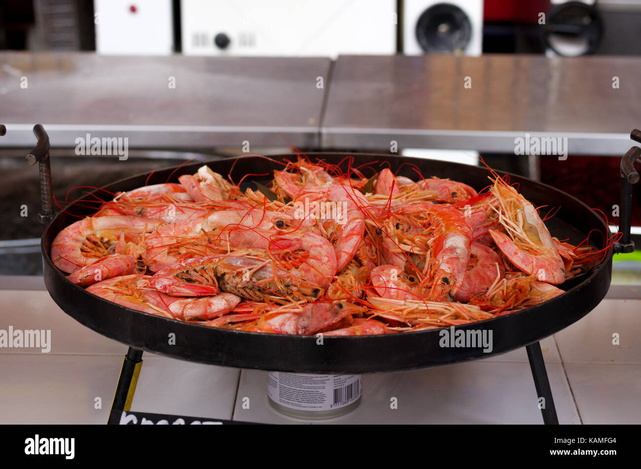 Preparation of royal prawns. Seafood. Shrimp in a frying pan Stock ...