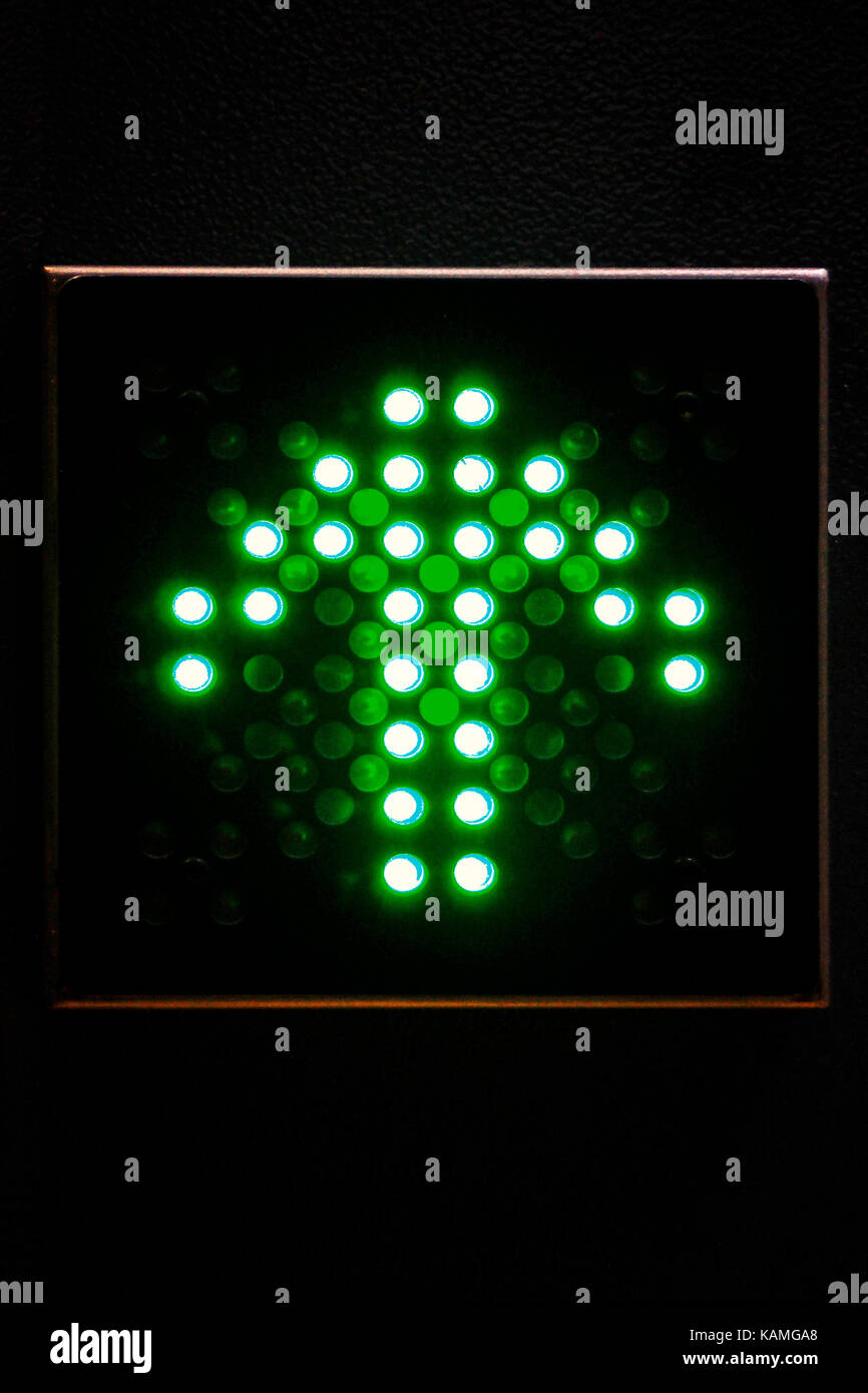 green led illuminated arrow sign Stock Photo - Alamy