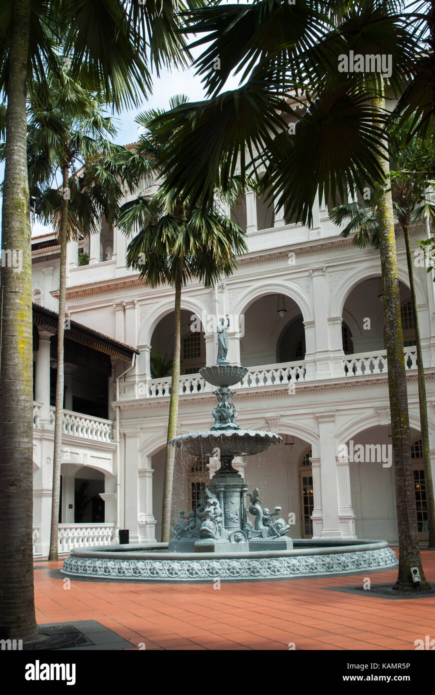 A courtyard within the renowned Raffles Hotel, Singapore, established ...