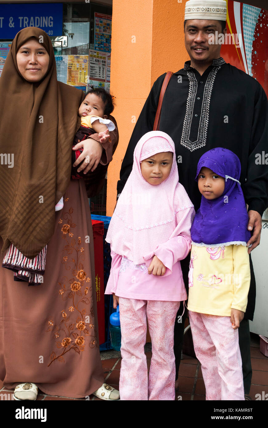 Malay family outside the Geylang Serai market, Singapore Stock Photo ...