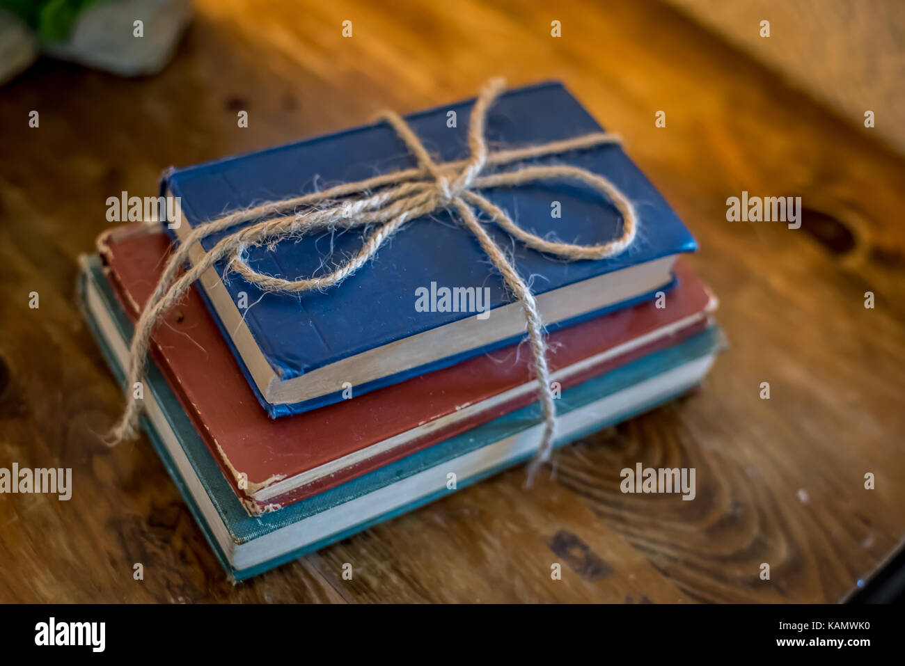old books tied with rope Stock Photo - Alamy