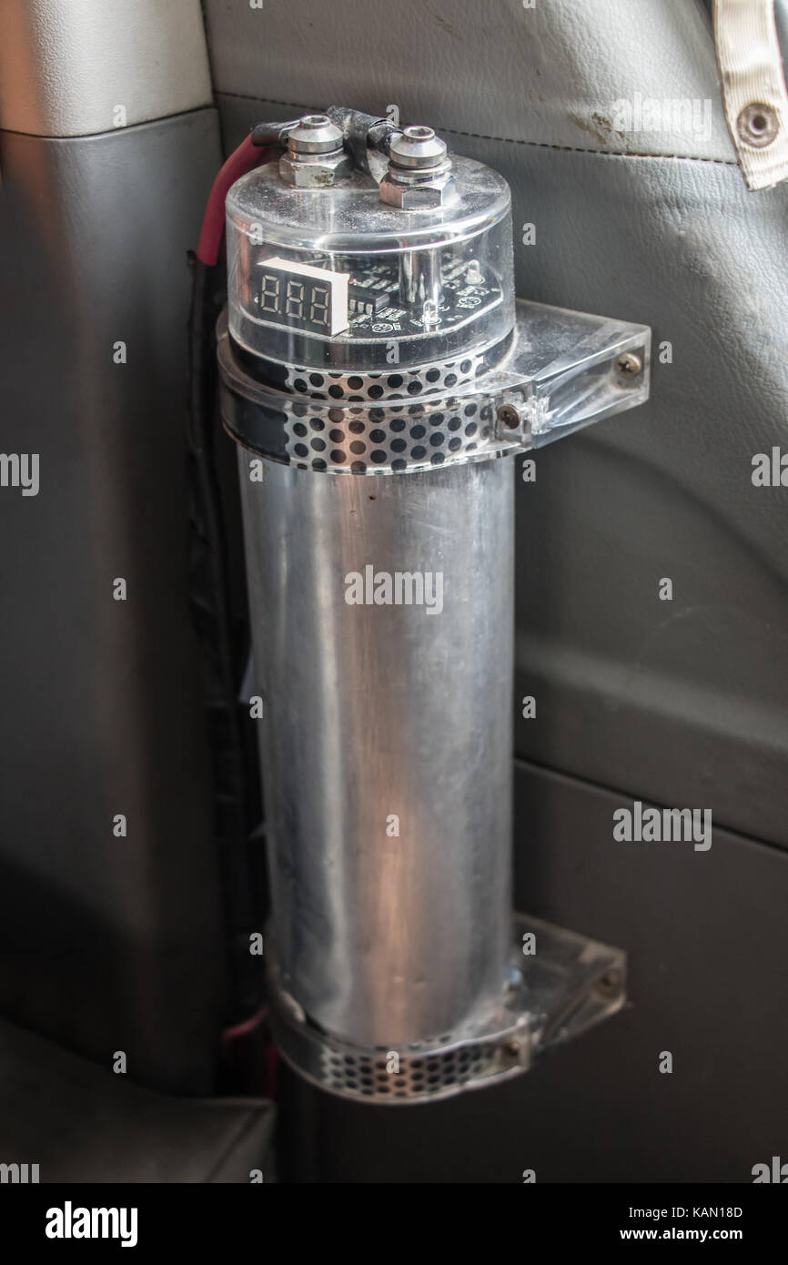 A capacitor or cap inside car (called stiffening caps), electronic ...