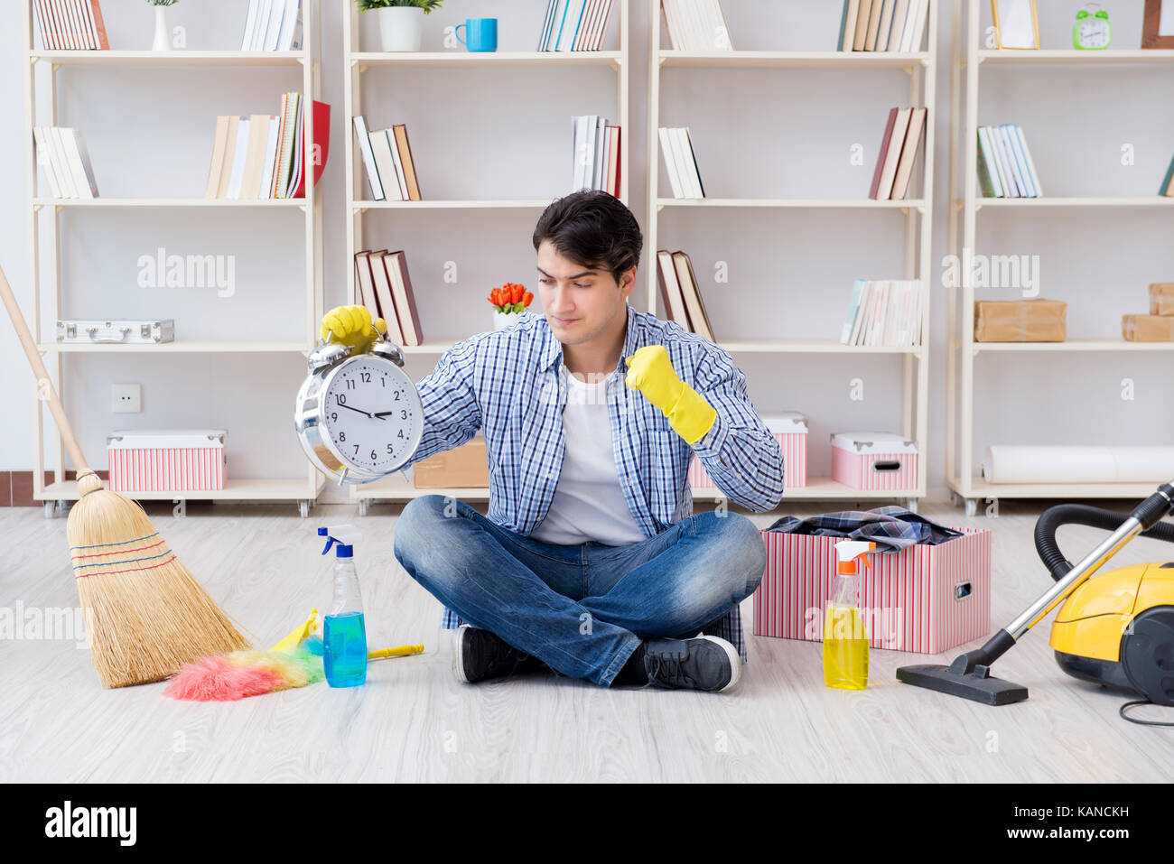 Man doing cleaning at home Stock Photo - Alamy