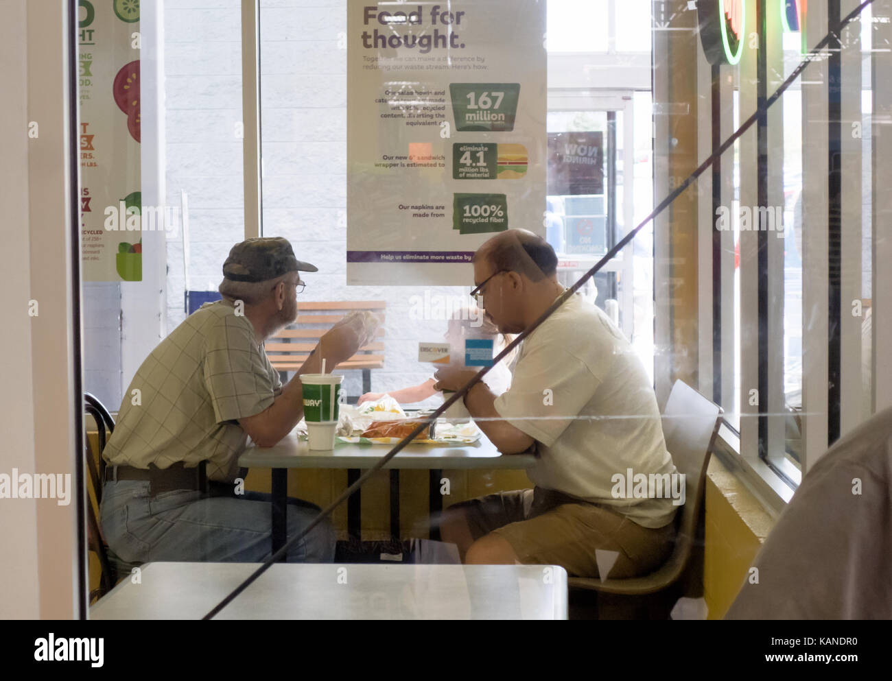 Boy eating a giant sandwich hi-res stock photography and images - Alamy