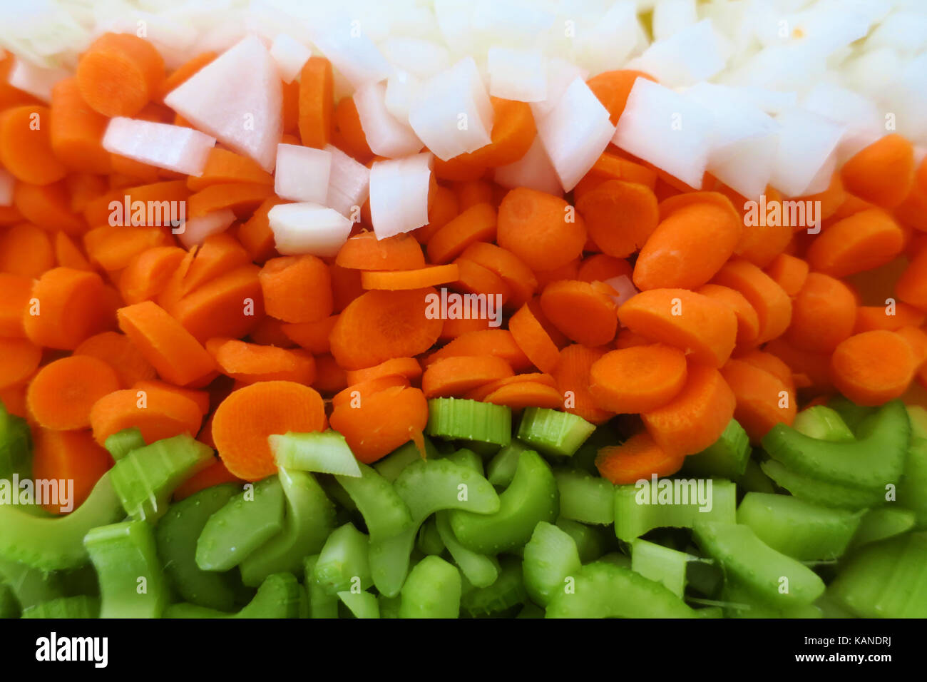 Piles of chopped carrots, onions, and celery Stock Photo - Alamy