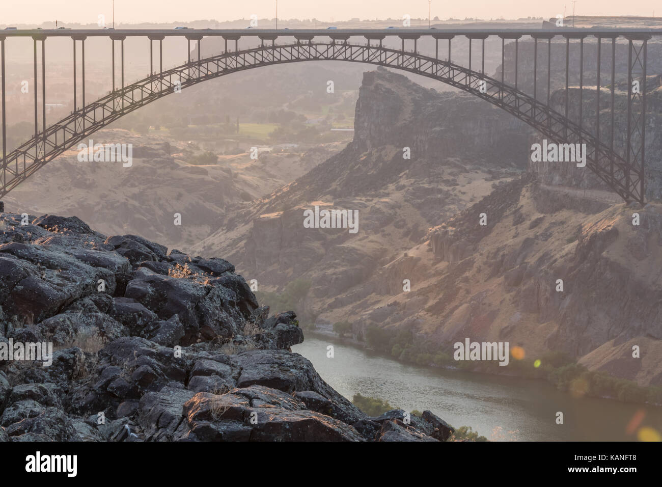Rocky Cliff Looks Out Over The Perrine Bridge at Sunset in Twin Falls ...