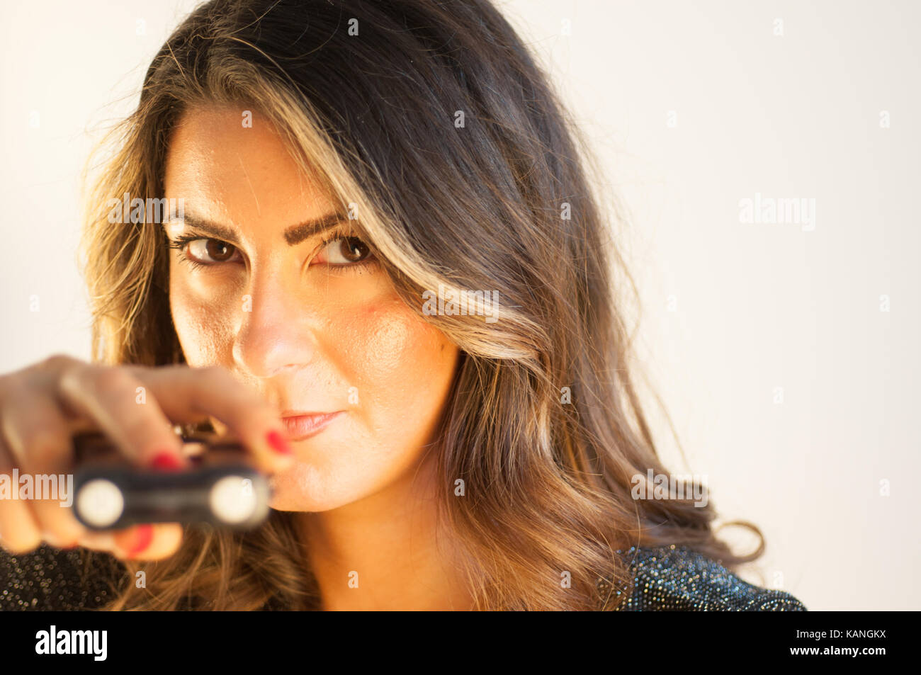 a beautiful chili gun for girl protection Stock Photo - Alamy