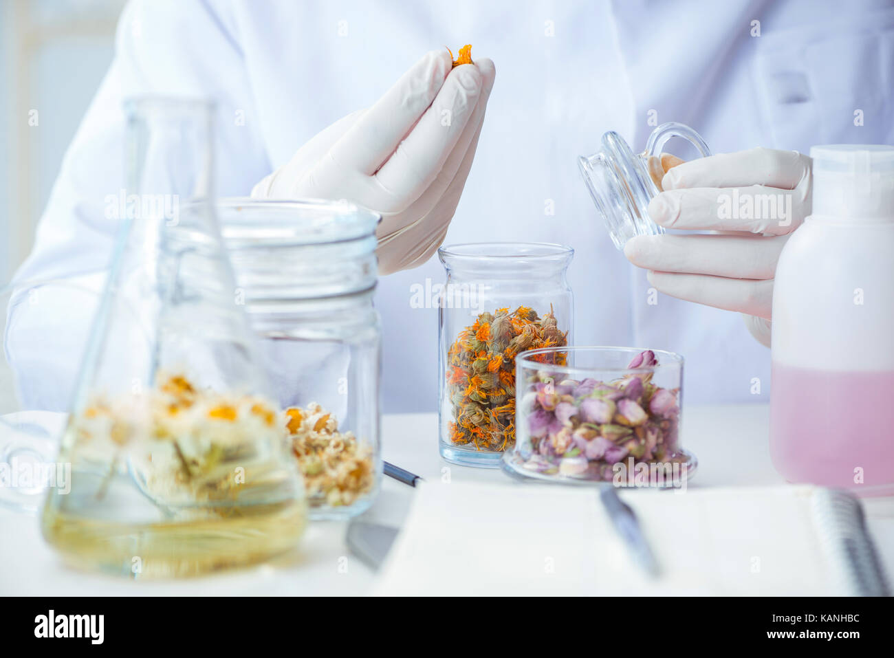 Chemist mixing perfumes in the lab Stock Photo - Alamy