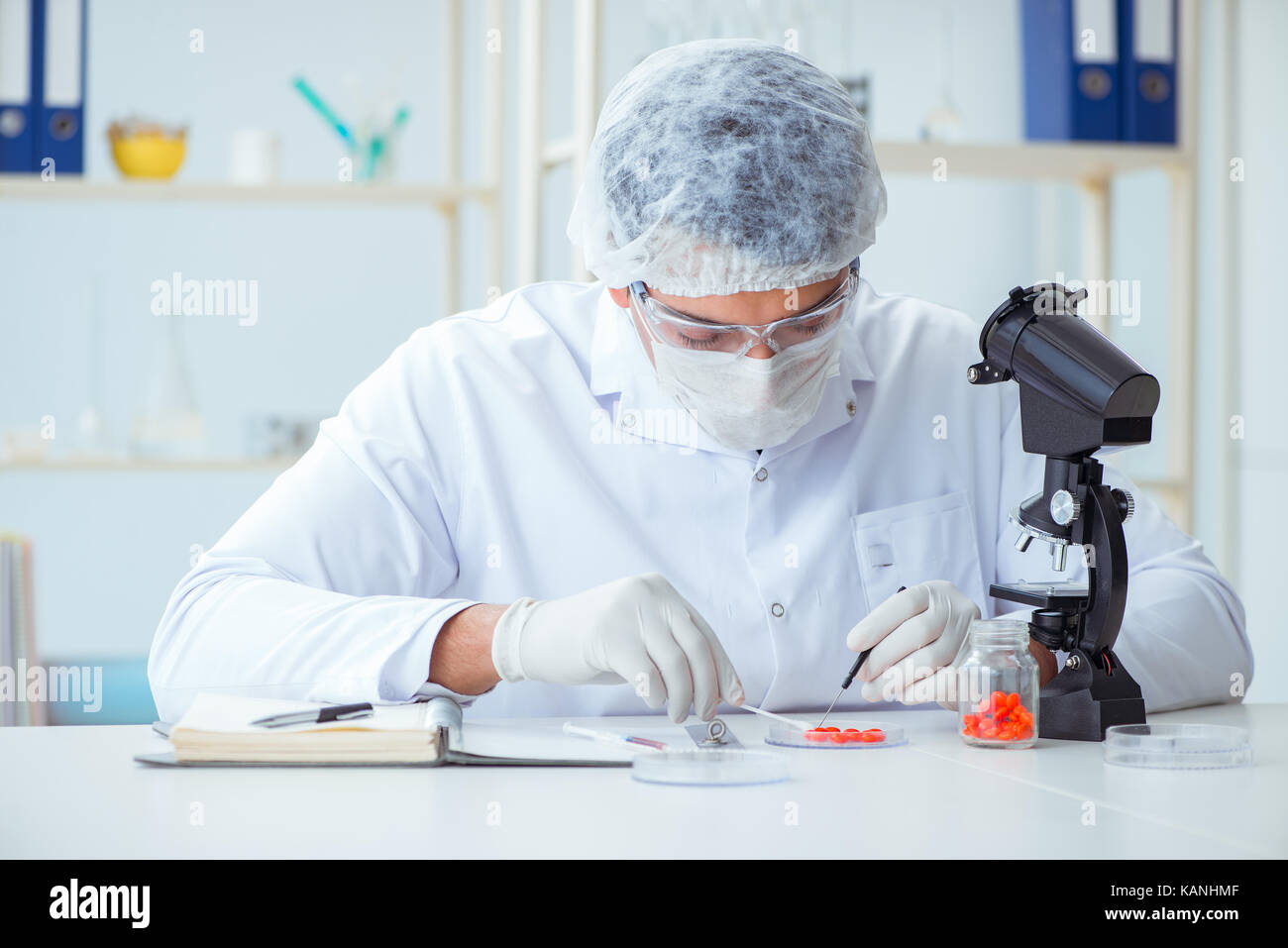 Doctor testing new drugs for medical purposes Stock Photo - Alamy