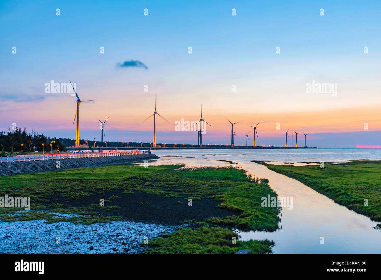 Scenic evening view of wind farm in Gaomei wetlands Stock Photo - Alamy