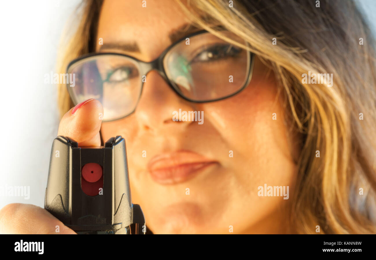 red pepper spray for girl security Stock Photo - Alamy