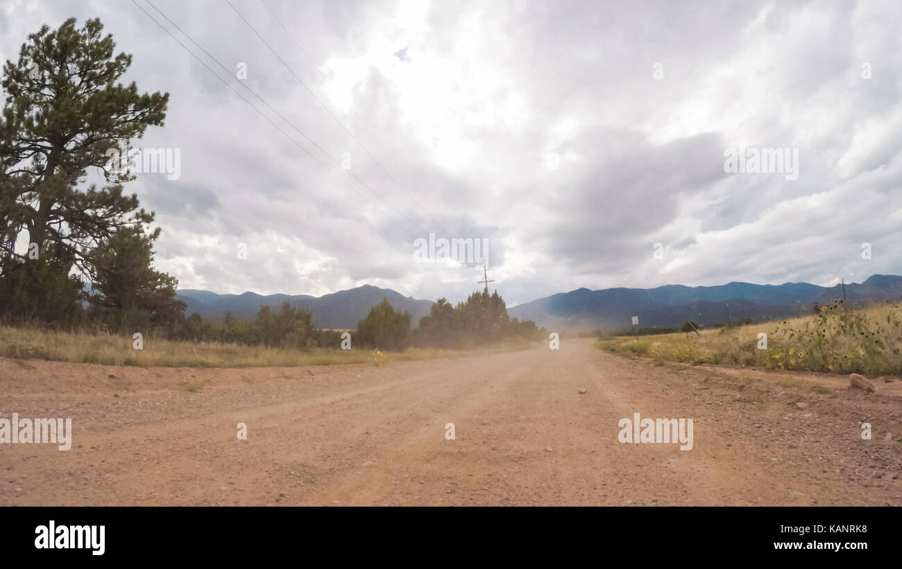 Driving in rural area of Western Colorado on cloudy day Stock Photo - Alamy