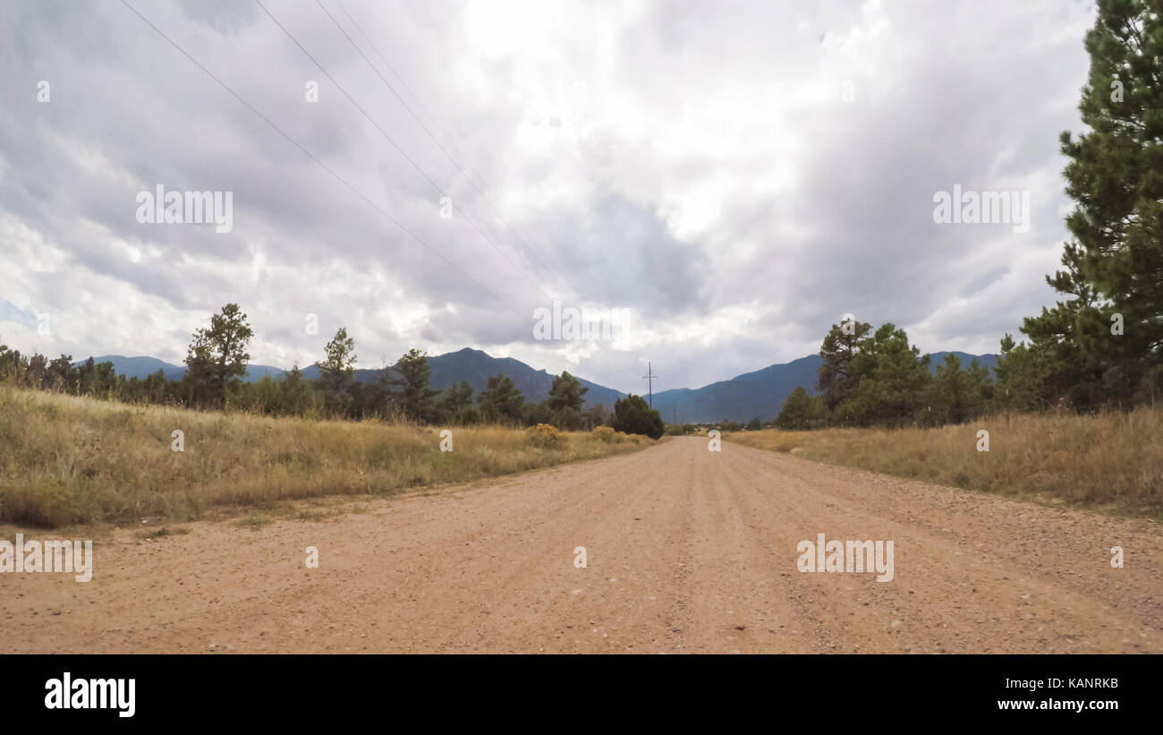 Driving in rural area of Western Colorado on cloudy day Stock Photo - Alamy