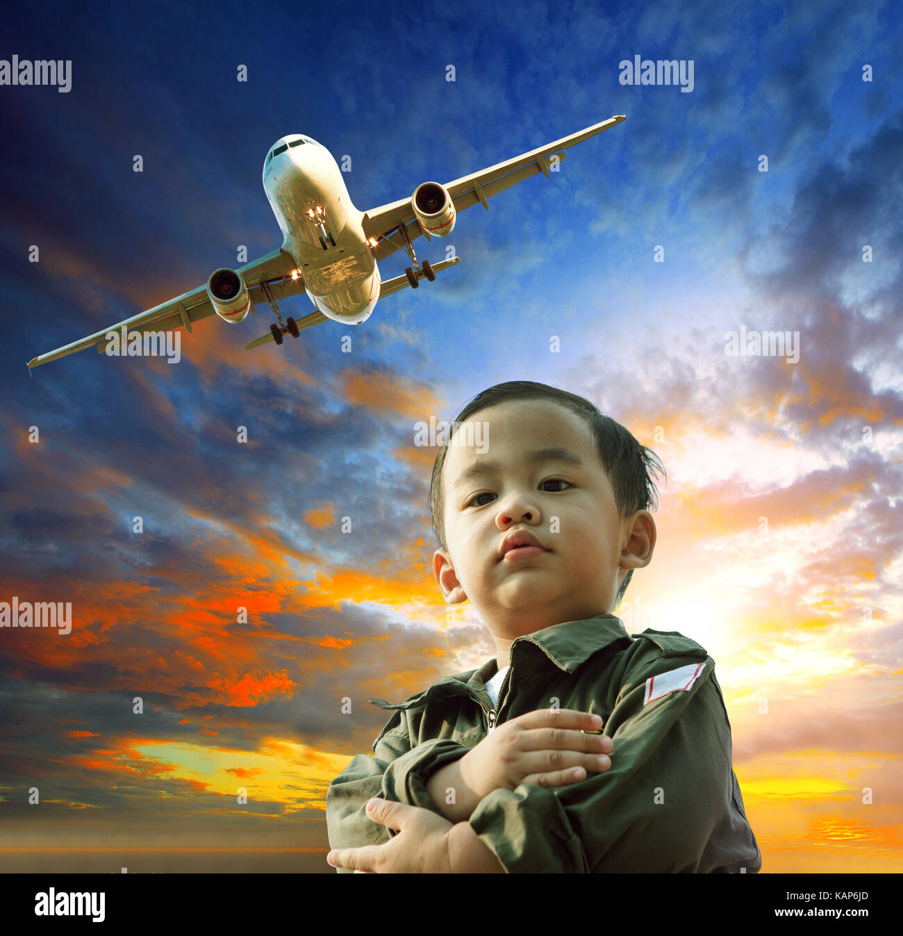 asian children dreaming to be plane pilot Stock Photo - Alamy