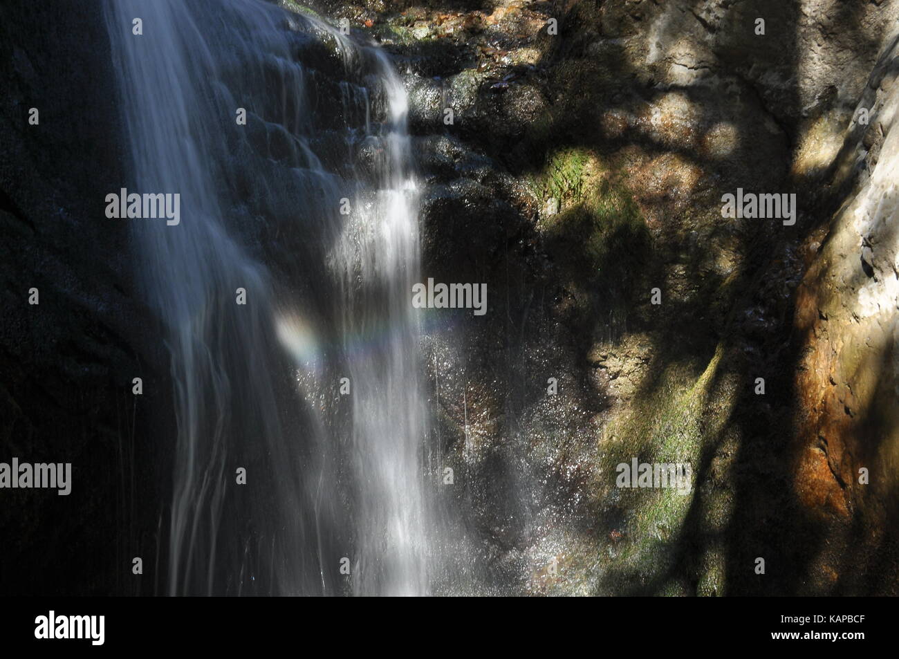 Rainbow at the waterfall Millomeris, in the mountains in Cyprus Stock ...
