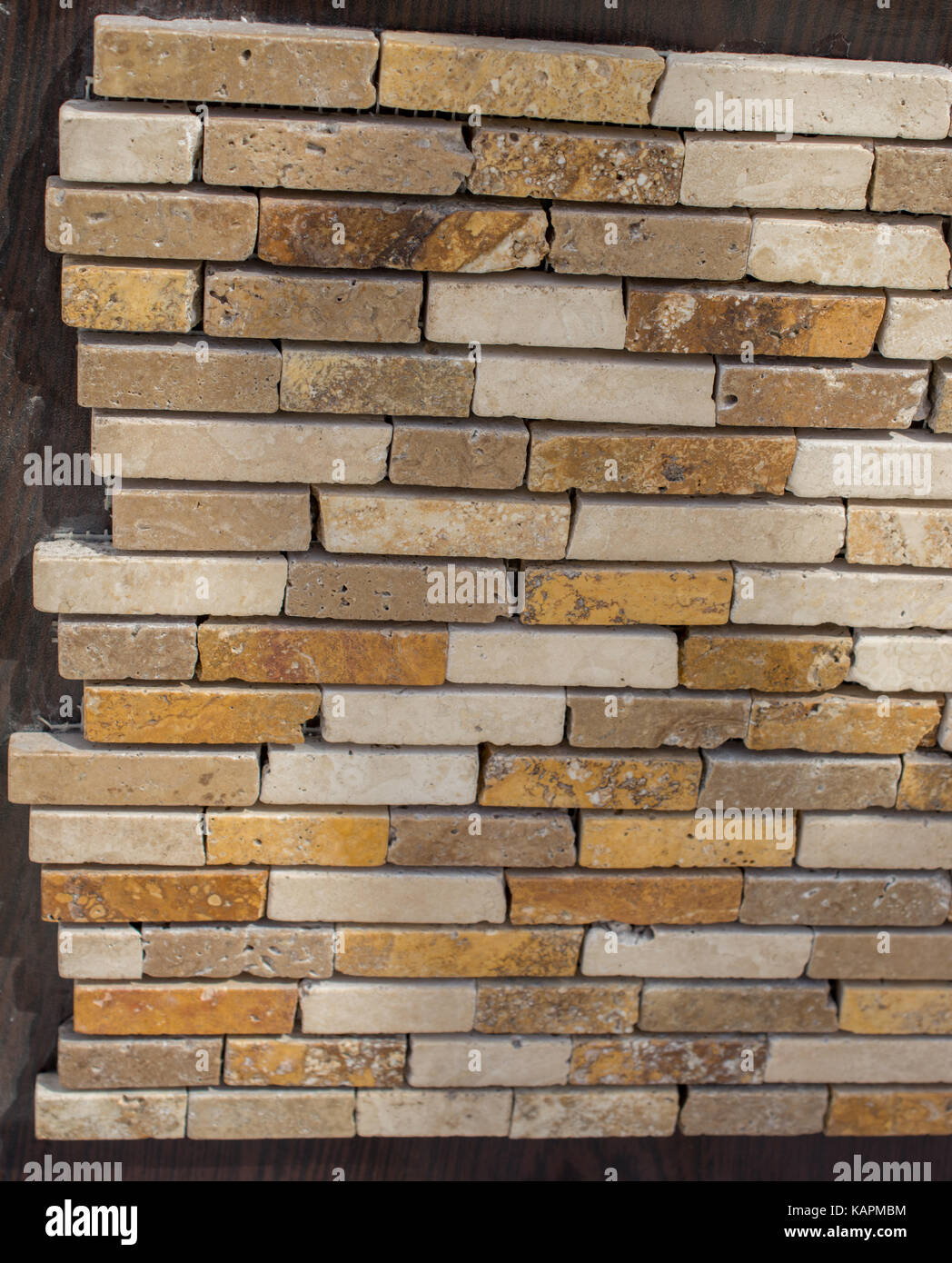 Decorative cubic stone wall as background texture Stock Photo - Alamy