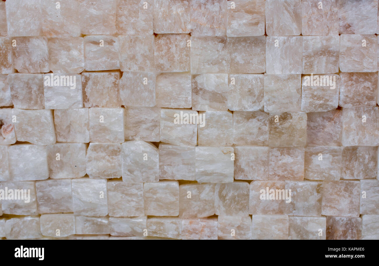 Decorative cubic stone wall as background texture Stock Photo - Alamy