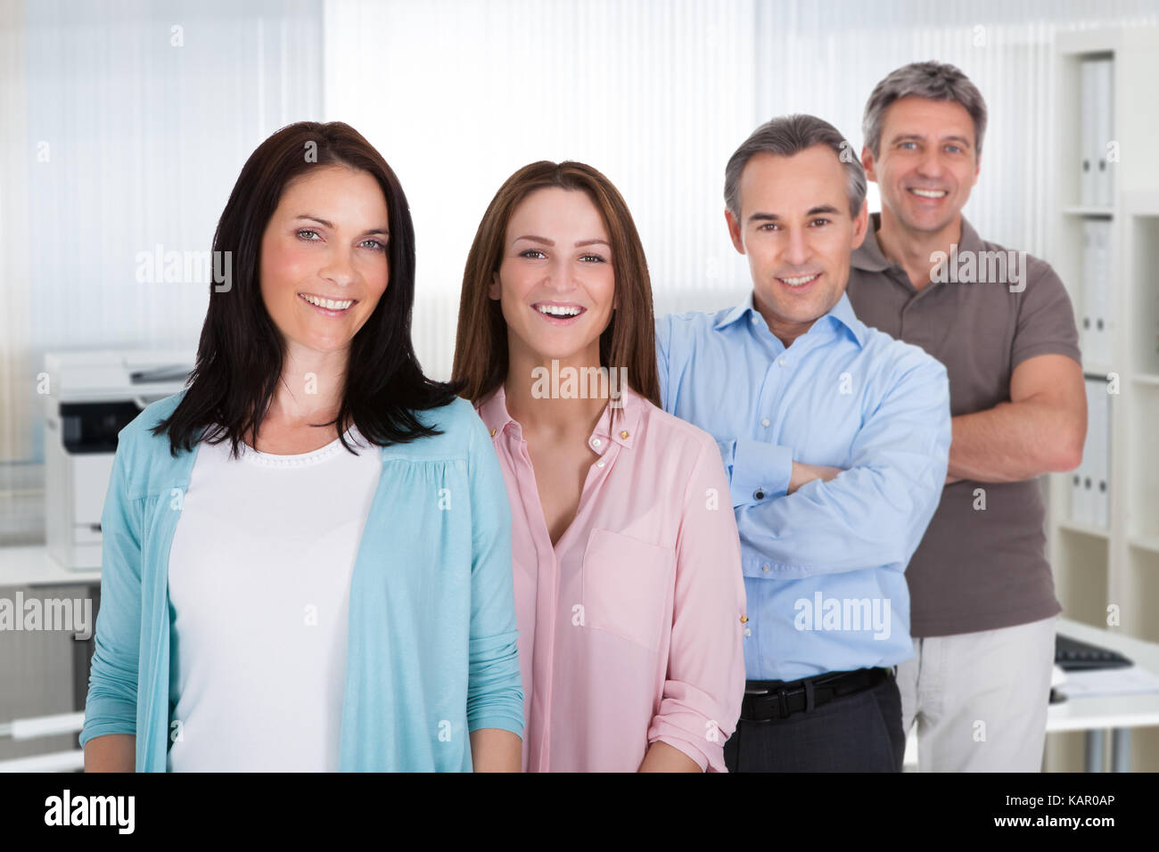 Team standing hi-res stock photography and images - Alamy