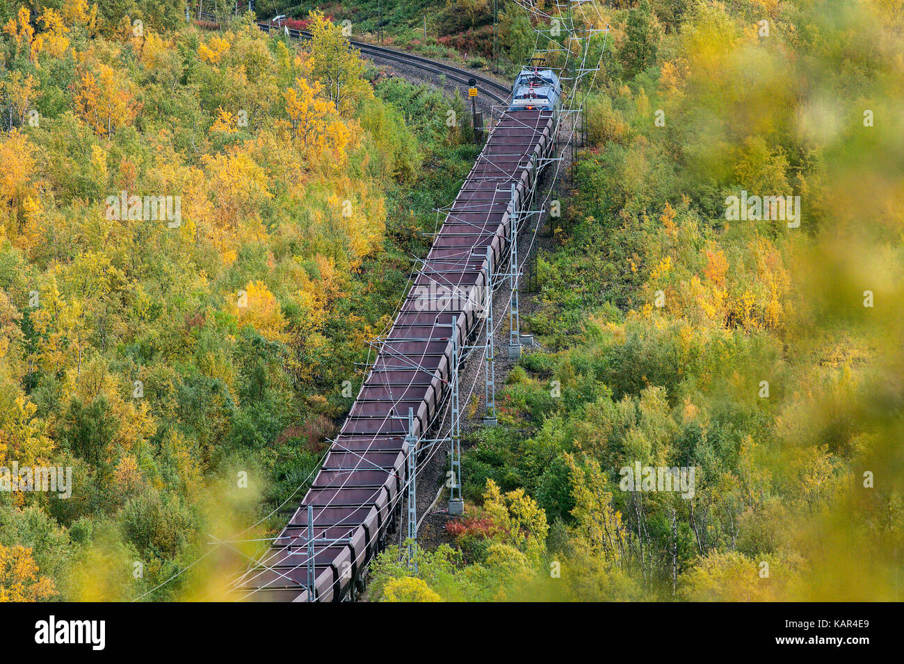 IRON ORE LINE, SWEDEN ON SEPTEMBER 13, 2017. View of a train pass the ...
