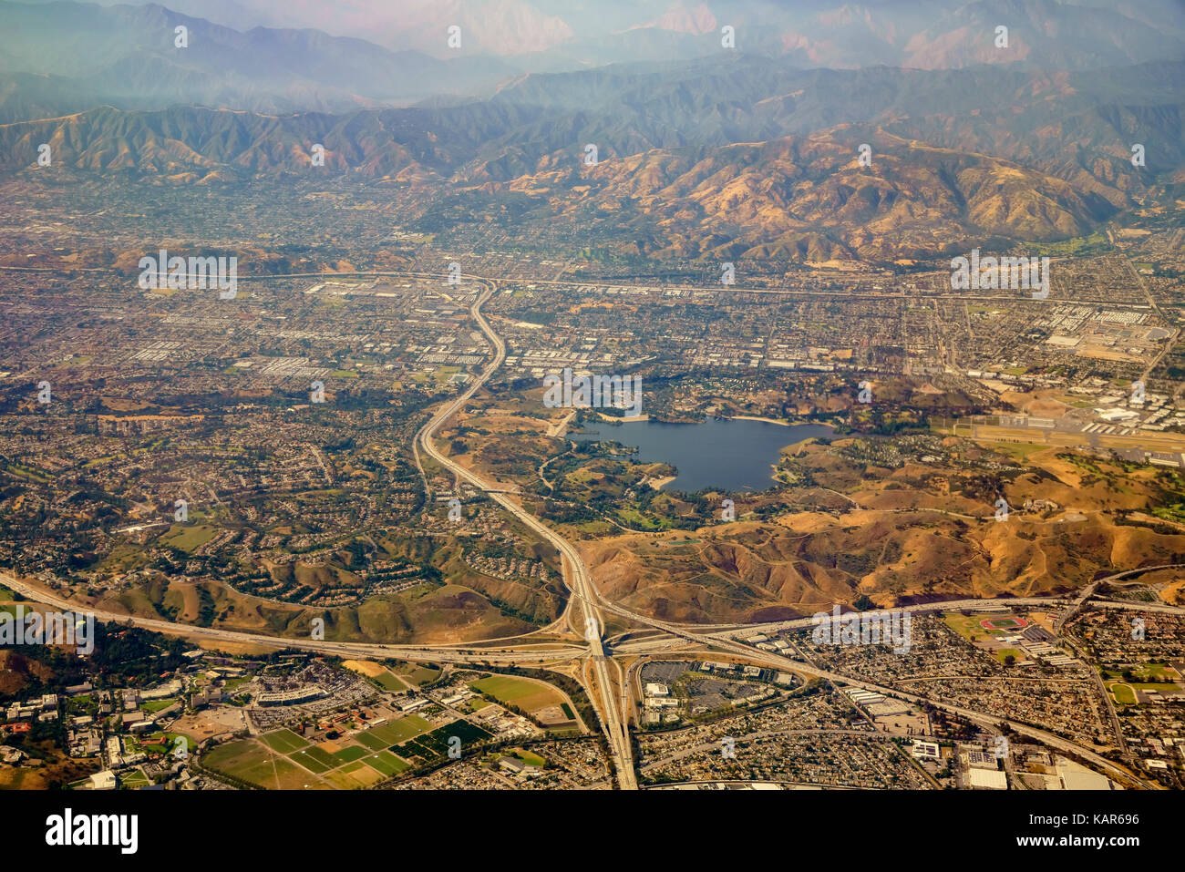 Aerial view of San Dimas and Puddingstone Reservoir, view from window ...