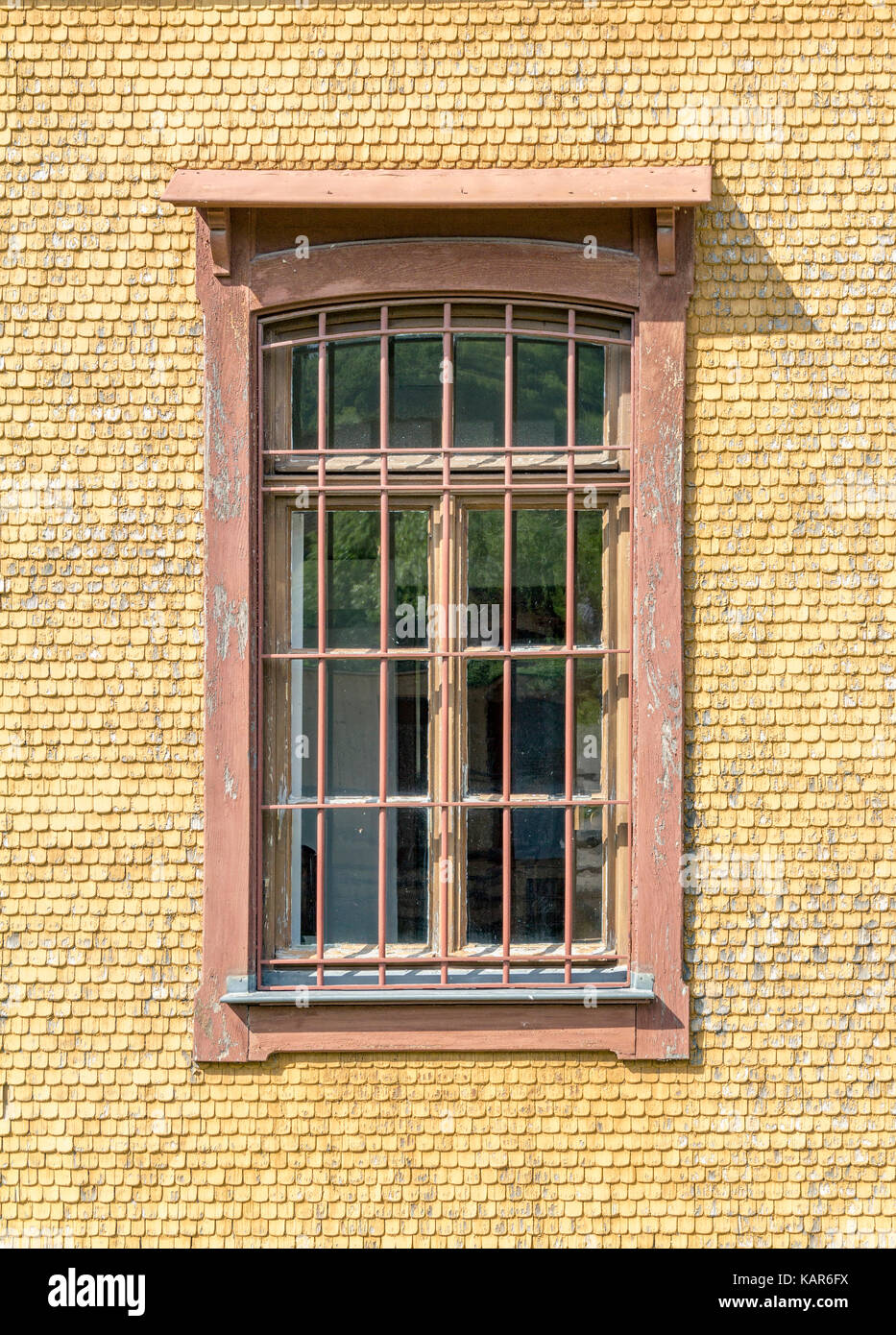 historic wood paneled house facade with barred window Stock Photo - Alamy