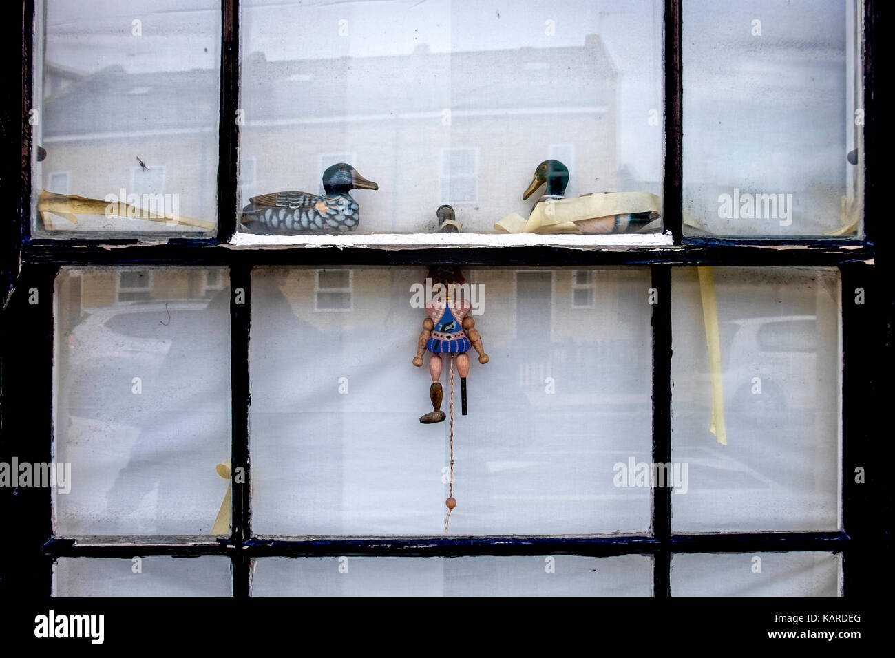 House window with two wooden ducks and wooden toy man,quirky,fun ...