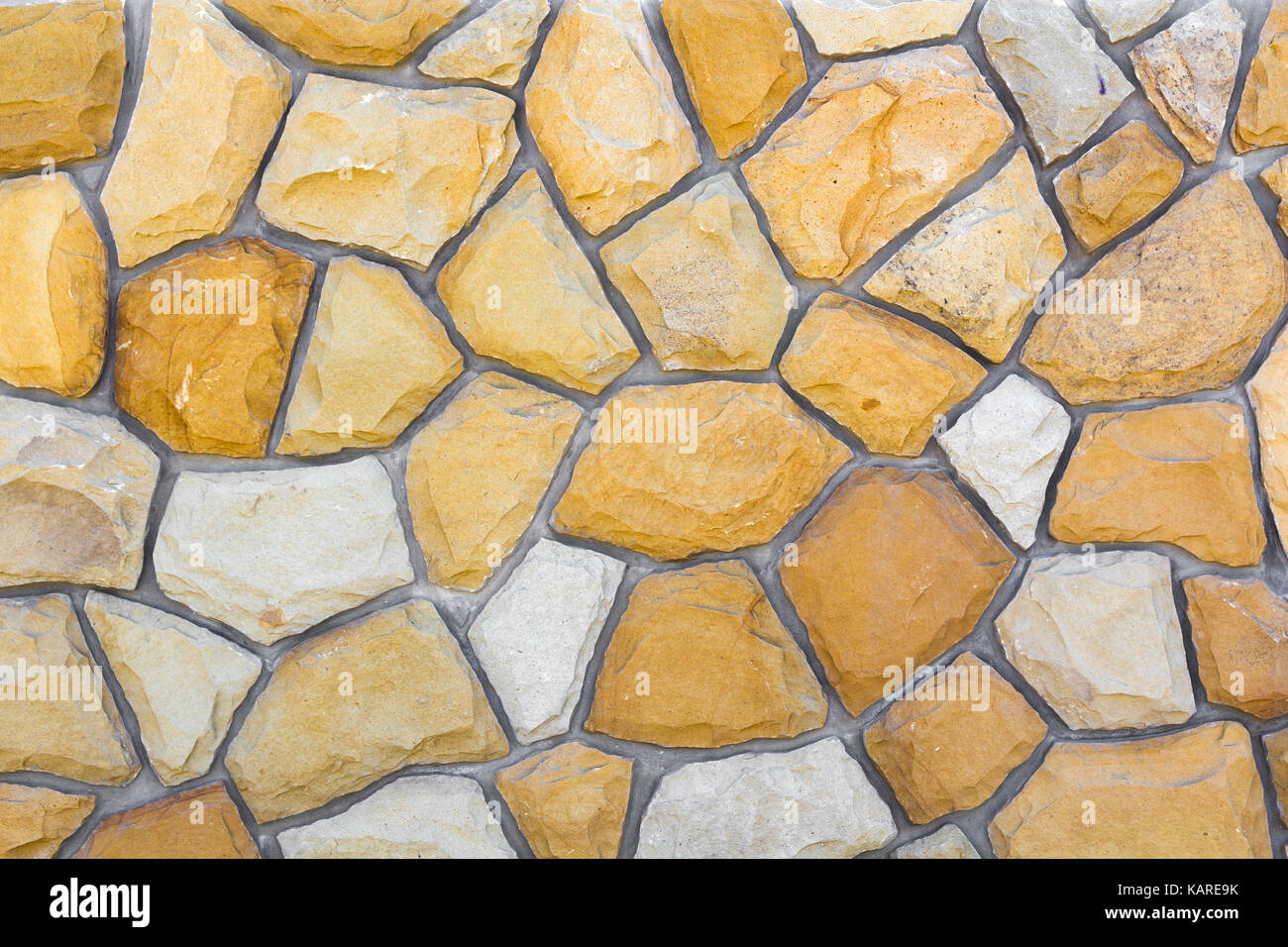 Different sizes of sand stones. Stone wall pattern background Stock ...