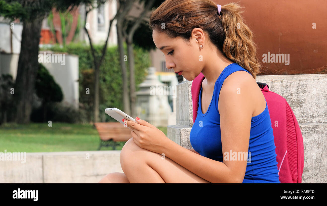 Female Reading Tablet Stock Photo - Alamy