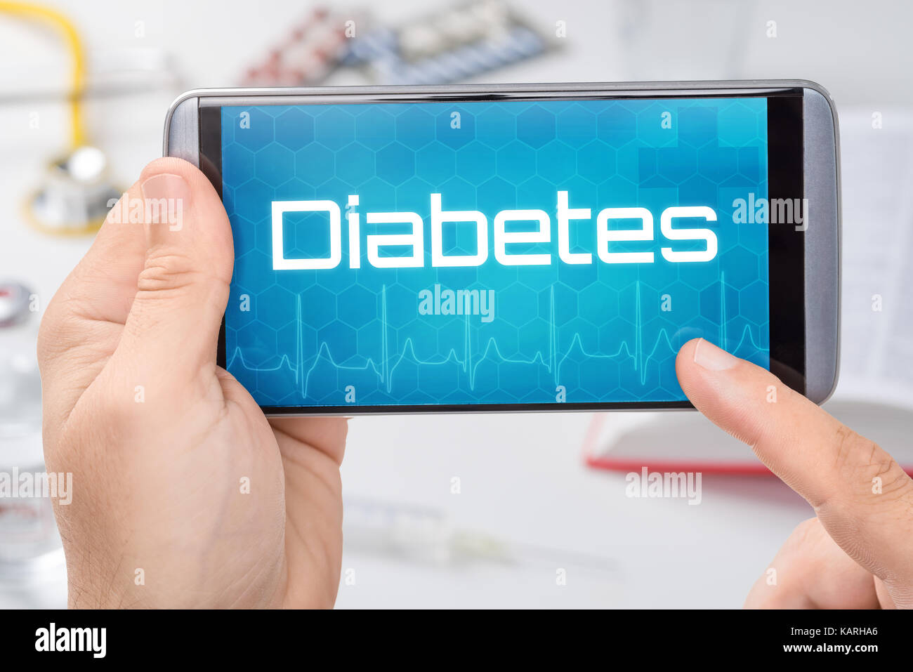 Smartphone with the text Diabetes on the display Stock Photo - Alamy