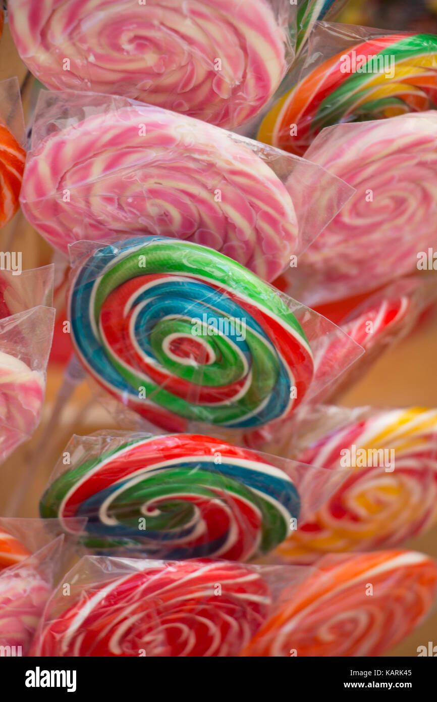 delicious colorful swirl candy and sweets for kids Stock Photo - Alamy