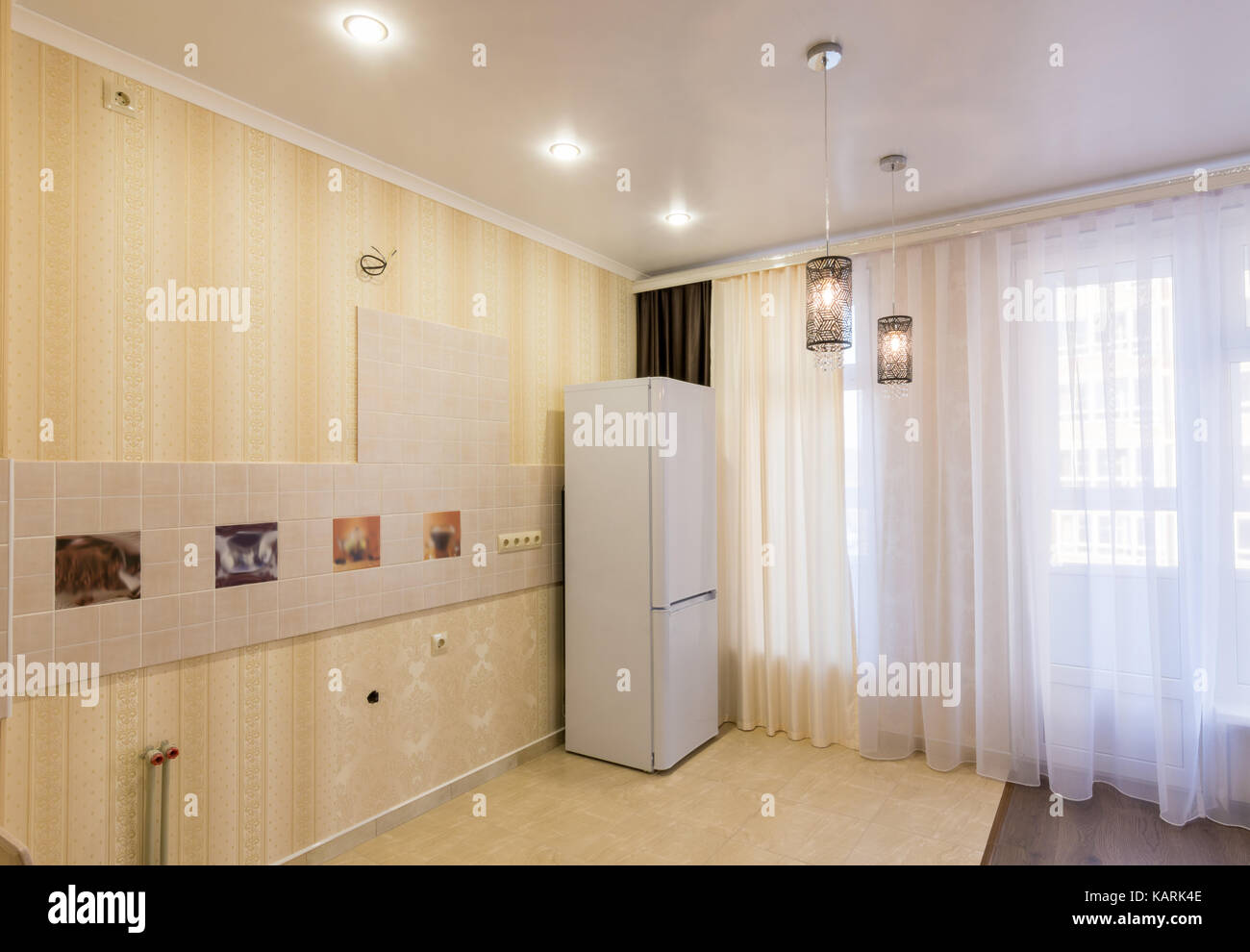 Interior of an empty kitchen without furniture, view of the place for a ...
