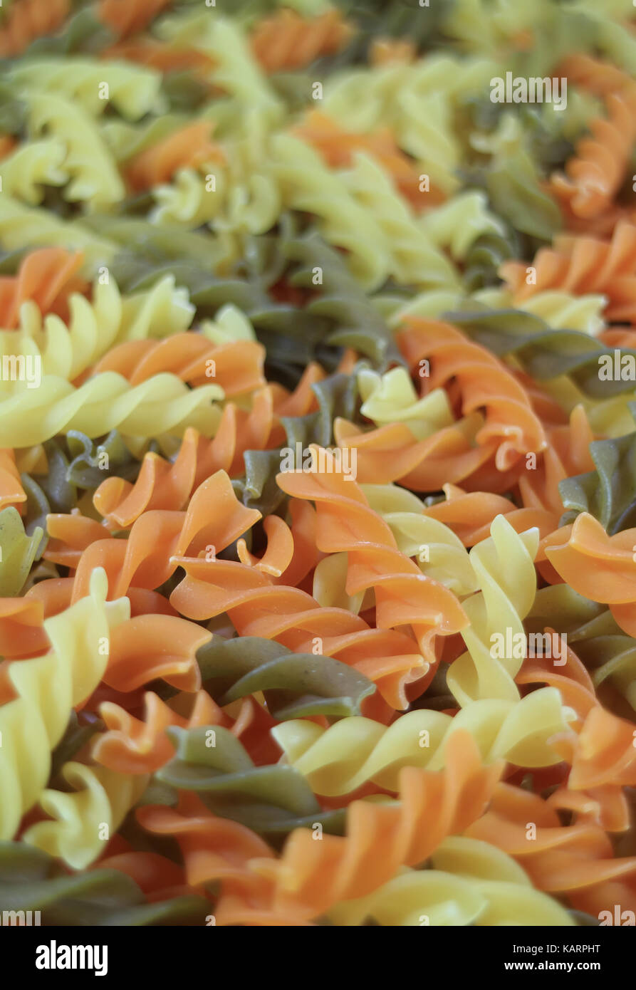 Close-up of Uncooked Tricolor Fusilli, Three-Color Twist Shaped Pasta ...