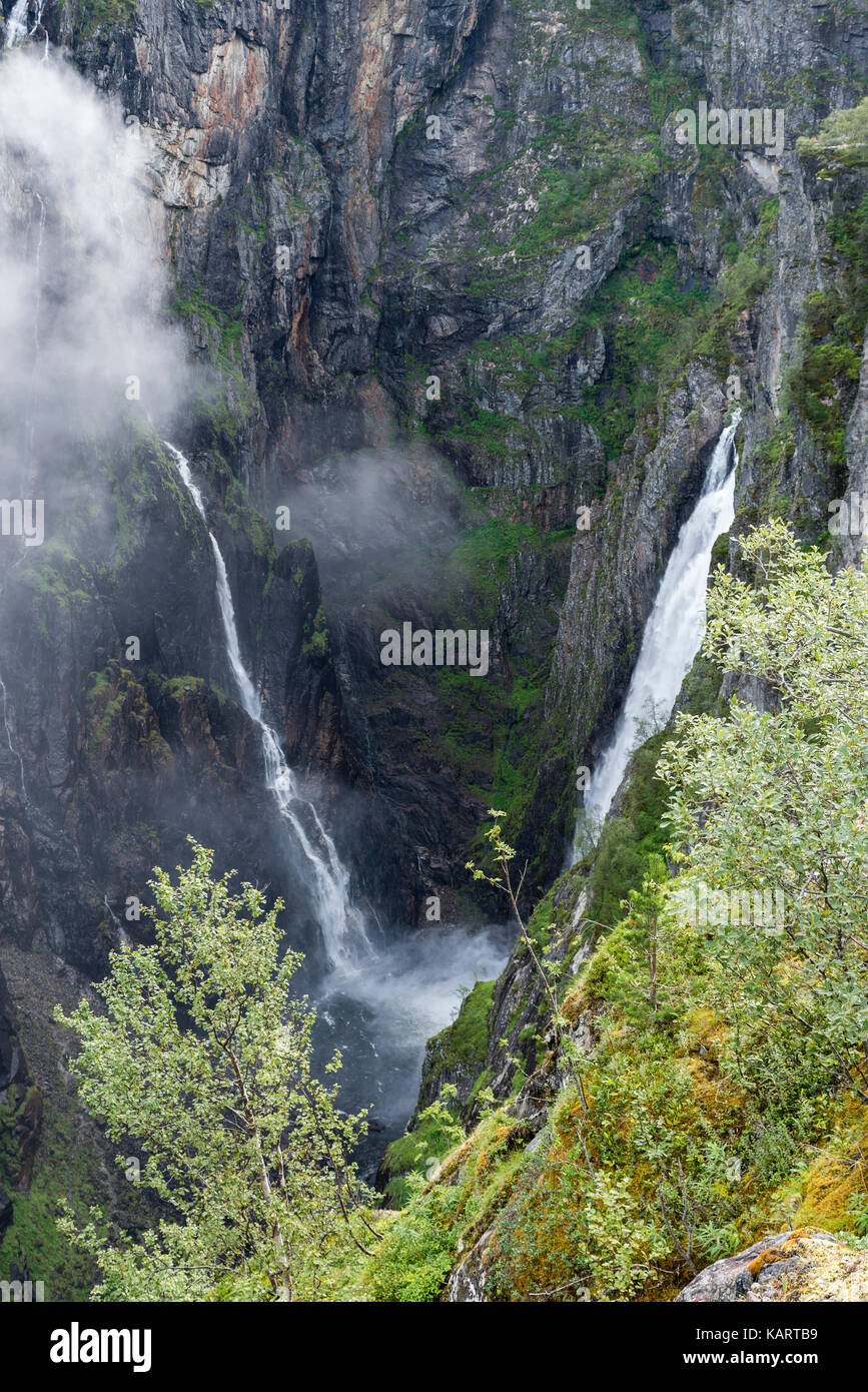 Voringfossen waterfall in norway seen from street level on sunny day ...