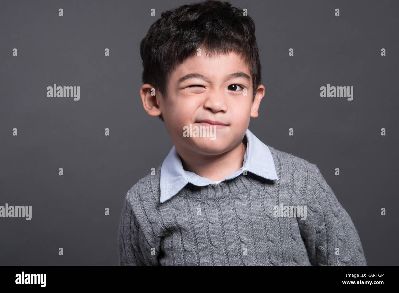 Studio portrait of East Asian male child Stock Photo - Alamy