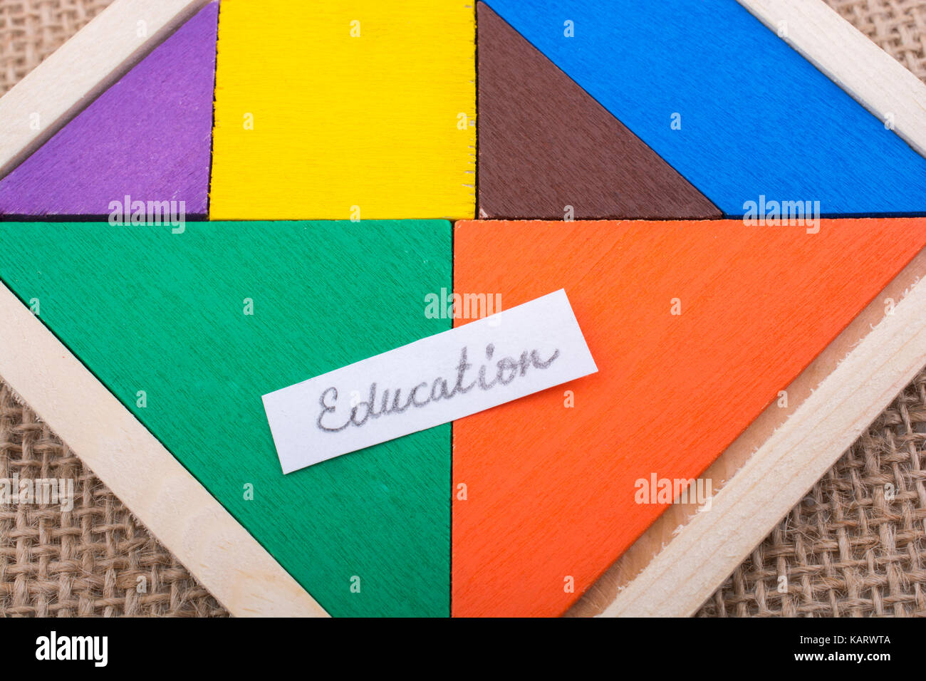 Colorful pieces of a square tangram puzzle Stock Photo - Alamy